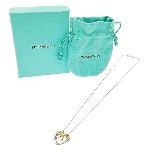 Tiffany & Co. | Jewelry | Tiffany Gold Ribbon Heart Necklace Silver ...